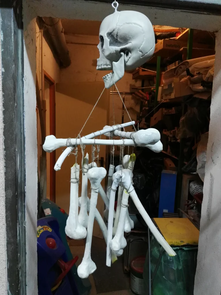 How to Make a Creepy Wind Chime from Raspberry Branches and Fake Bones
